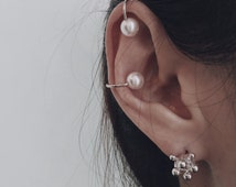 Popular items for pearl ear cuff on Etsy