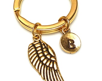 Gold angel wing ring | Etsy