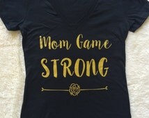 Black with gold mom game strong tee, women's tee