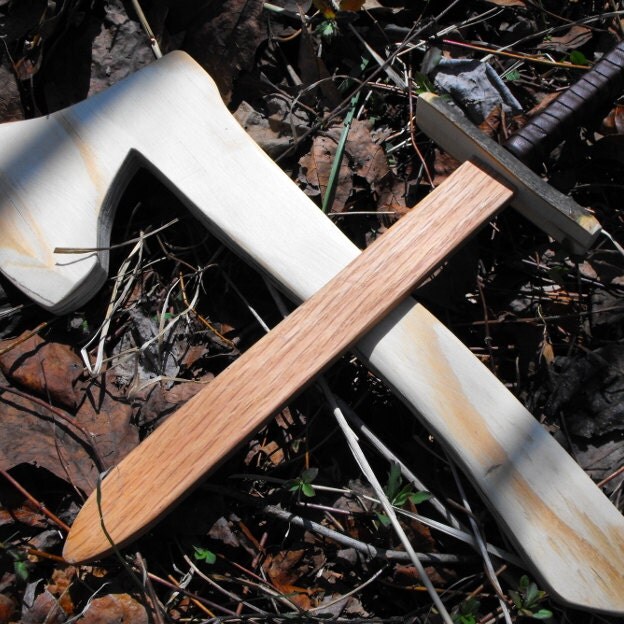 The original maker of Tree Branch Hilted toy swords by IronForest