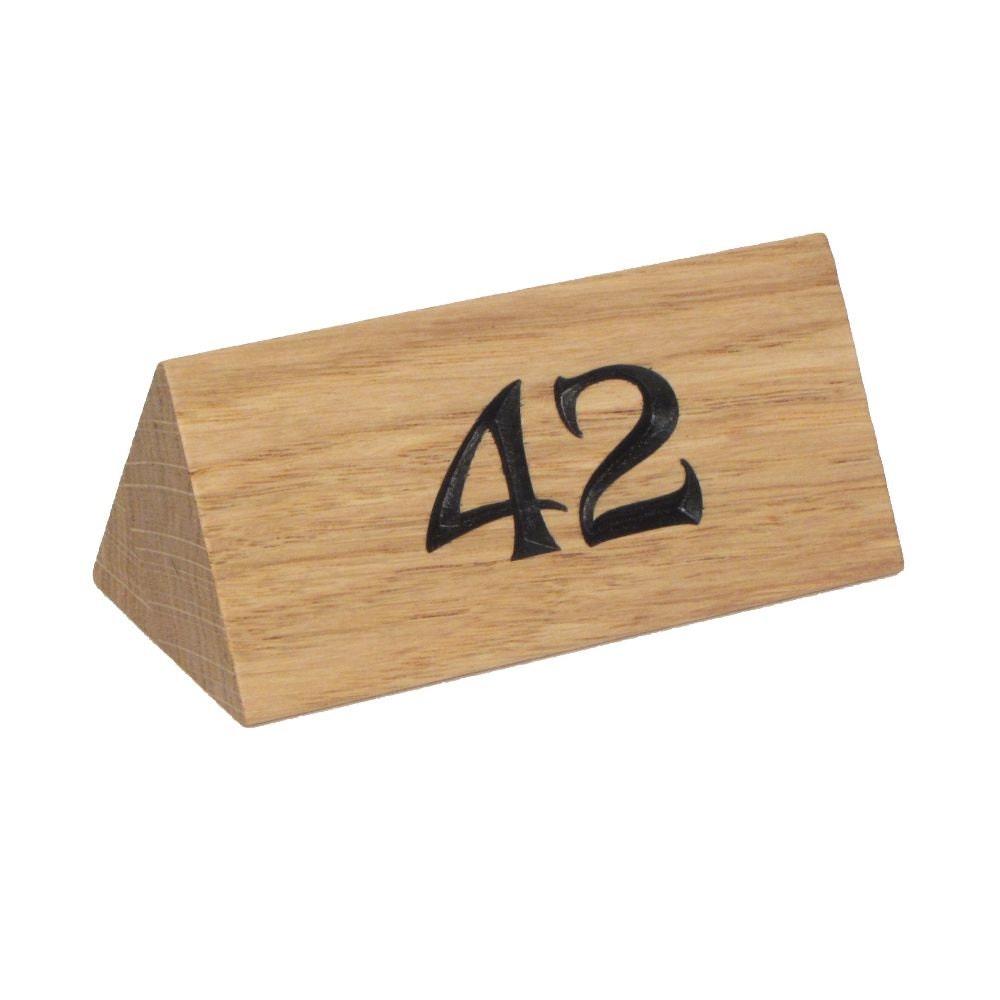 Table number sign triangle shaped sign.
