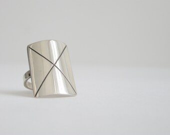 Items similar to Rectangular Hammered Shield ring in Silver on Etsy