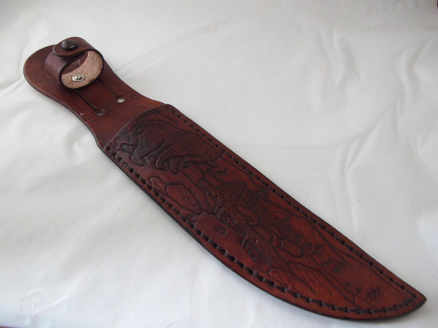 Large hand tooled leather knife sheath with a bear design Made