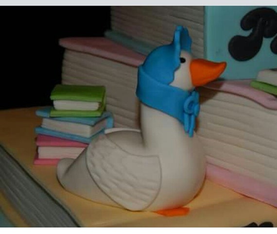 Mother Goose Fondant Cake Topper with stack of mini books