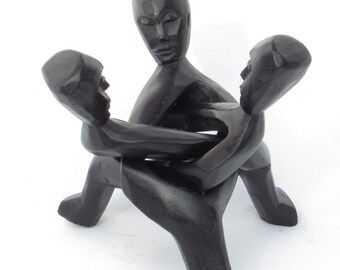 Intertwined men | Etsy