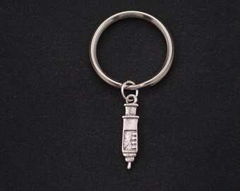 Syringe needle charm | Etsy