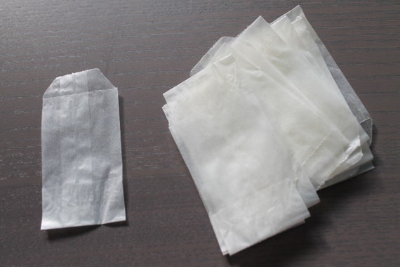 Transparent white parchment paper packets. White by PickaPack