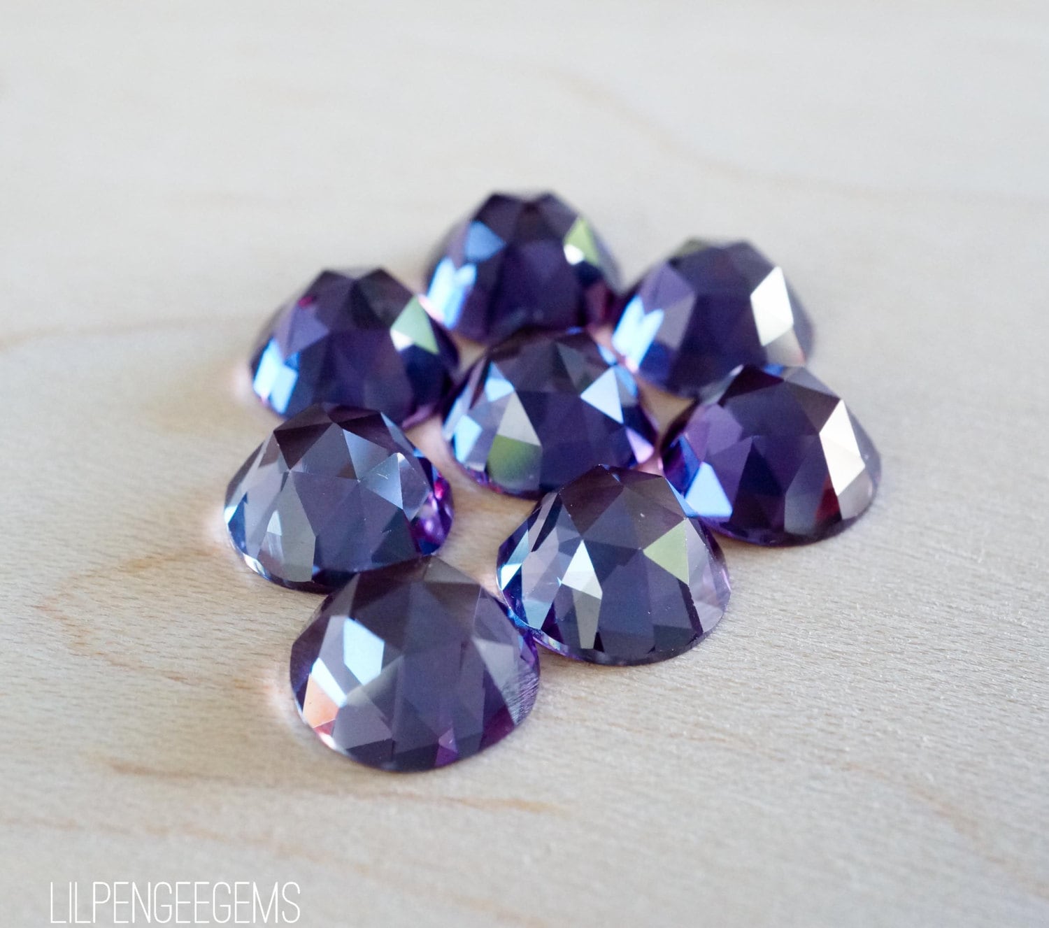 8mm rose cut Alexandrite cabochon. color by lilpengeeGems on Etsy
