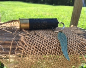 Pink-glittered shotgun shell key chain by RachelsRustics73 on Etsy