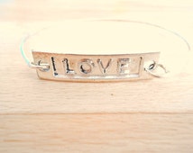 Popular items for silver love bracelet on Etsy