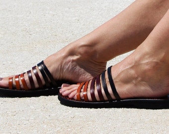 Unique style handmade leather sandals and leather goods by Calpas