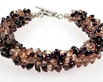 Items similar to handmade raspberry antique gold and crystal bracelet ...
