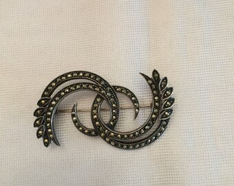 Items similar to Vintage Swirl Brooch w/ AB Rhinestones on Etsy