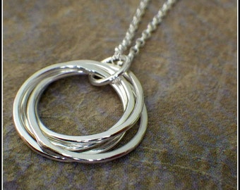 Interlocking rings | Etsy
