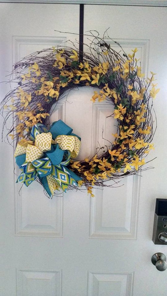 Items similar to Spring Forthysia Whispy Grapevine Wreath on Etsy