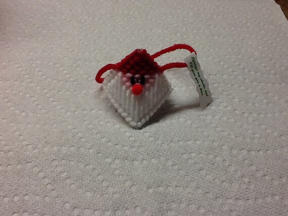 Squeeze my cheeks Santa ornament