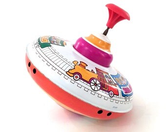 Metal spinning top | Etsy