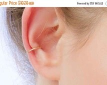 Unique faux conch earring related items | Etsy