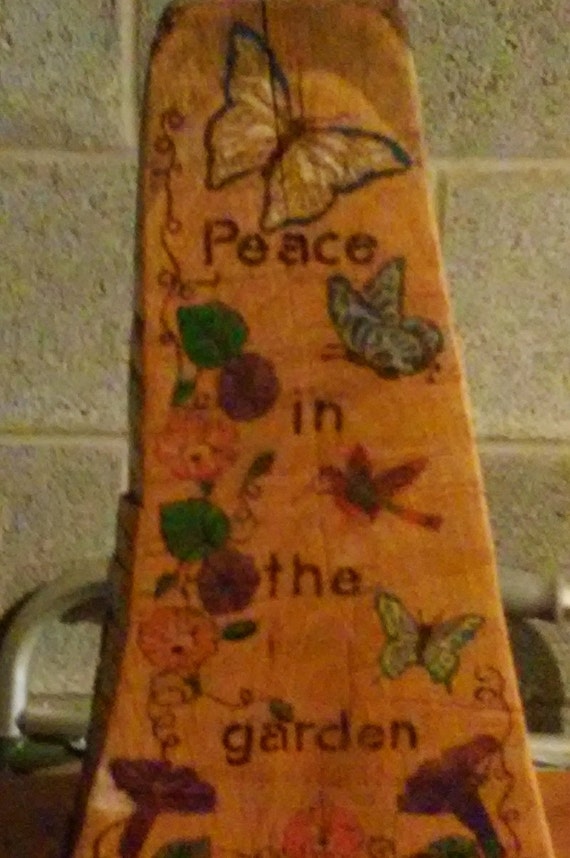Pyrography wood burned tree trunk slice wedge colorful garden