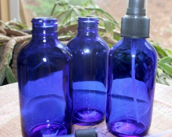 Blue glass bottle | Etsy