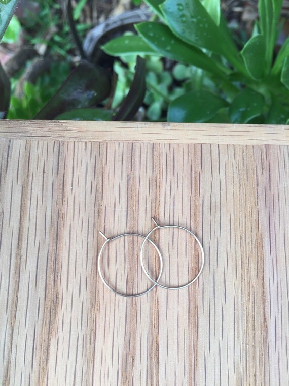 Items similar to 3/4" gold filled hoops on Etsy