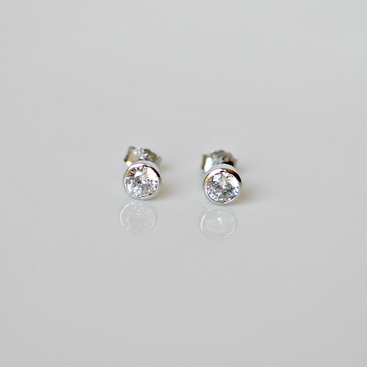 Diamond stud earrings sterling silver 4mm or 6mm round cz