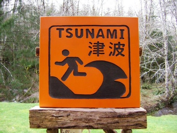 Oriental highway warning sign TSUNAMI in Japanese kanji and