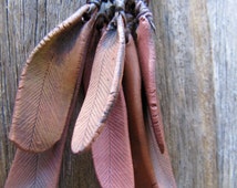 Unique ceramic feather related items | Etsy