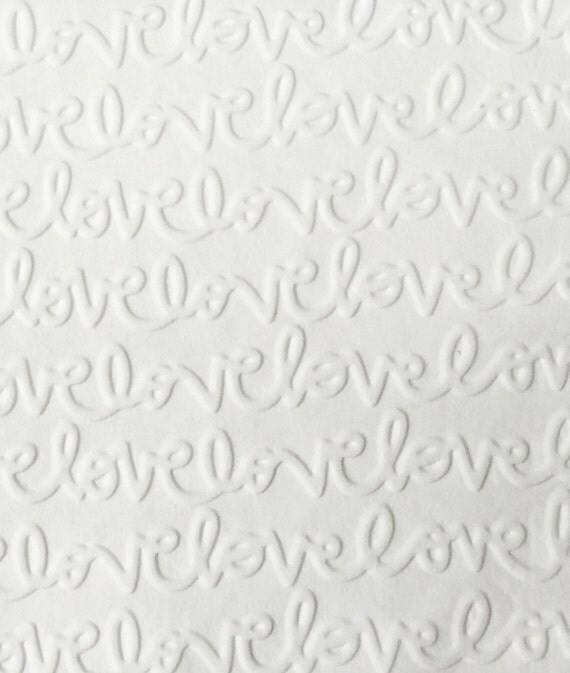 Pack of 50 embossed love cocktail napkins for your wedding
