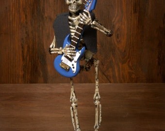 Skeleton with guitar | Etsy