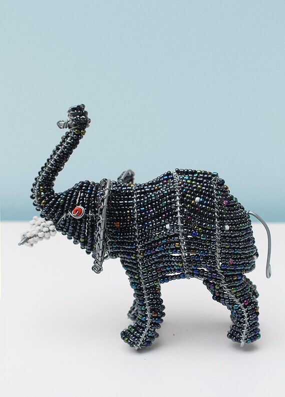 Beaded elephant with trunk up: This wire-framed African