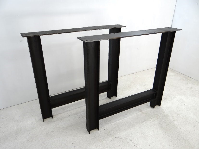I-beam dining table base with metal span by TimberForgeWoodworks