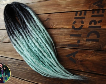 Set of crochet synthetic double ended dreads. Glows in the