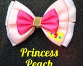 Items similar to Princess Peach inspired bow on Etsy