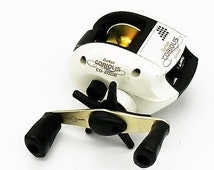 Unique fishing reels related items | Etsy