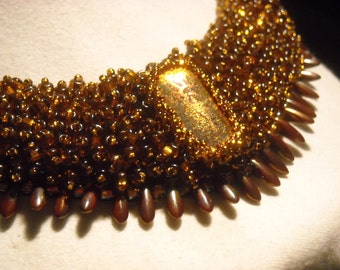 Items similar to Bronze Collar Bib Necklace on Etsy
