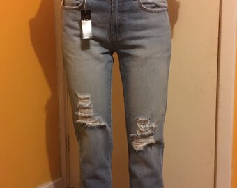 Items similar to Women's Ripped Boyfriend Jeans with African print ...