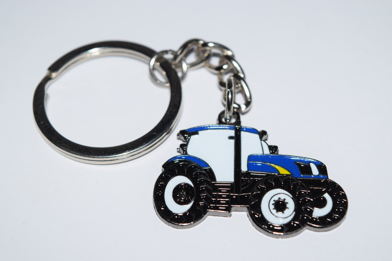 New Holland / Ford Blue Tractor Keyring. Detailed enamel key