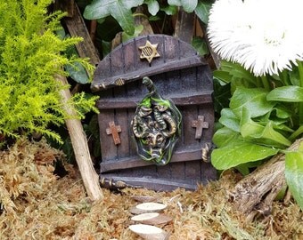 Enchanted forest fairy door