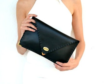 Unique leather clutch related items | Etsy