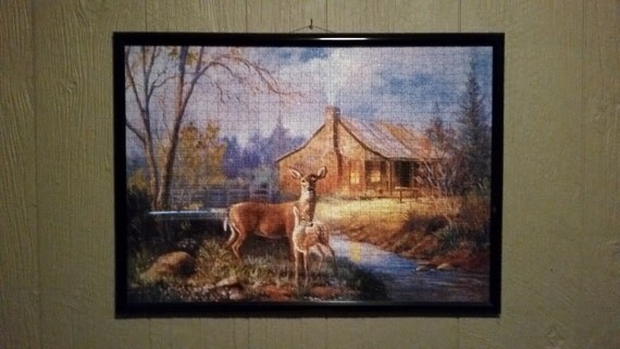 Deer and cabin in the woods/ framed puzzle