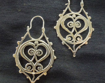 Symbol of devotion | Etsy