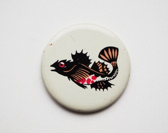 Fish medallion | Etsy