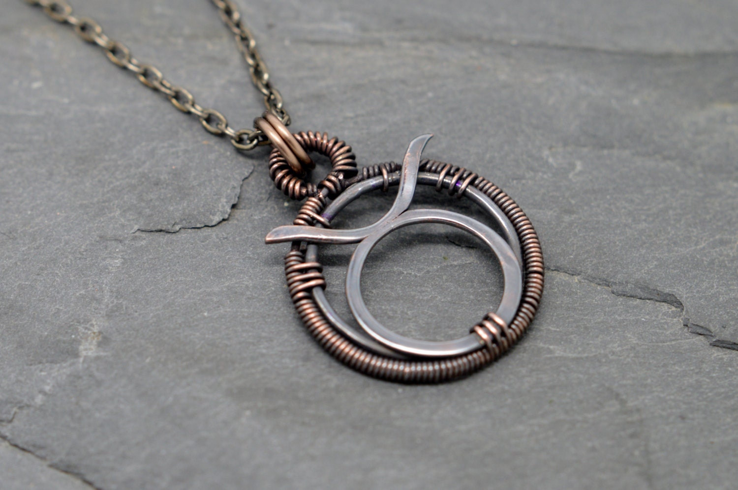 Taurus zodiac necklace wire wrapped in antiqued copper