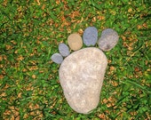 Pebbles rocks beach stones and driftwood. by madebynatureandme