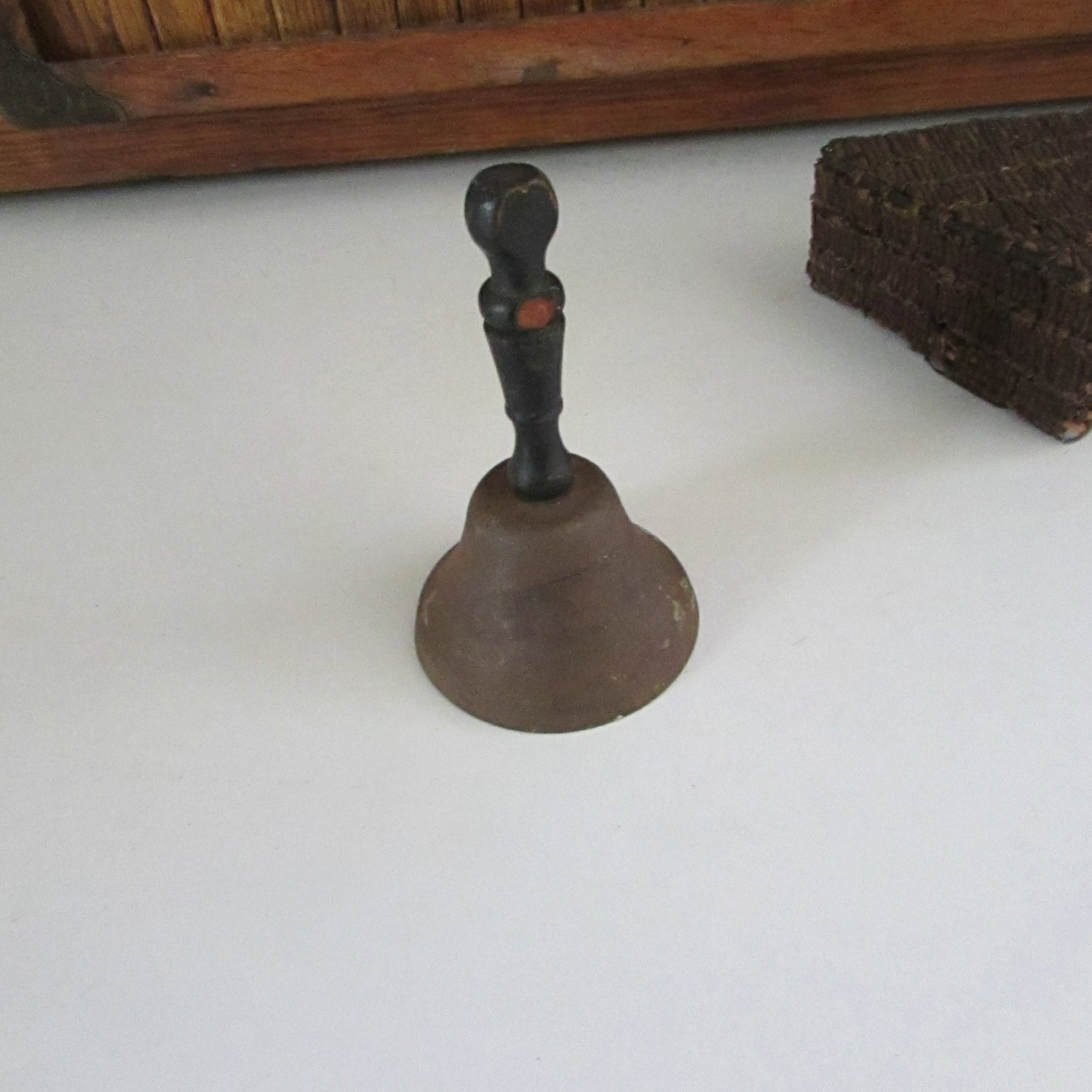 Rustic Rusted Metal Bell with Painted Wood Handle and Rope