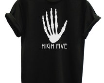 Popular items for skeleton hand tshirt on Etsy