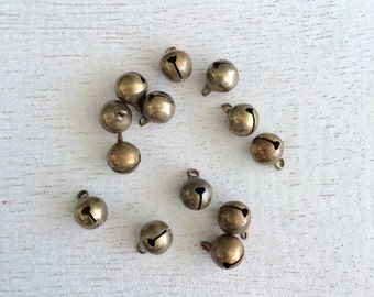 Tiny bell charm | Etsy