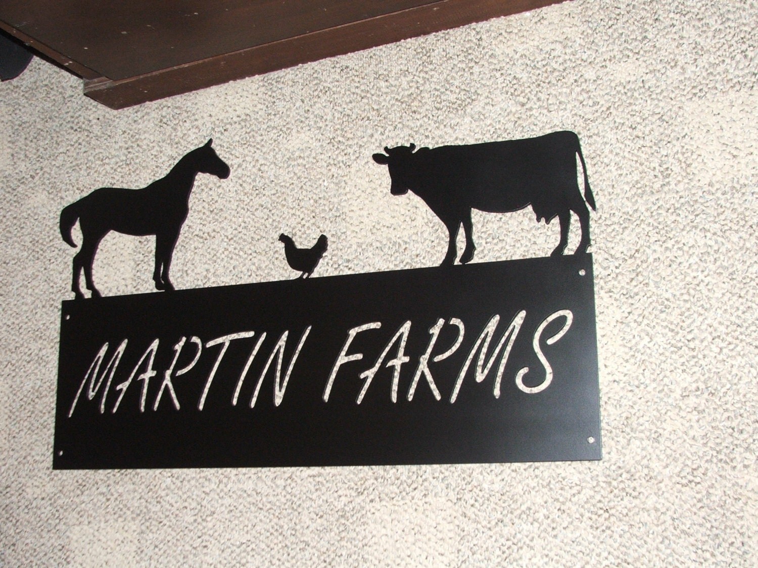 Custom cnc plasma cut signage for the in a satin black or