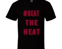 Popular items for miami heat shirt on Etsy